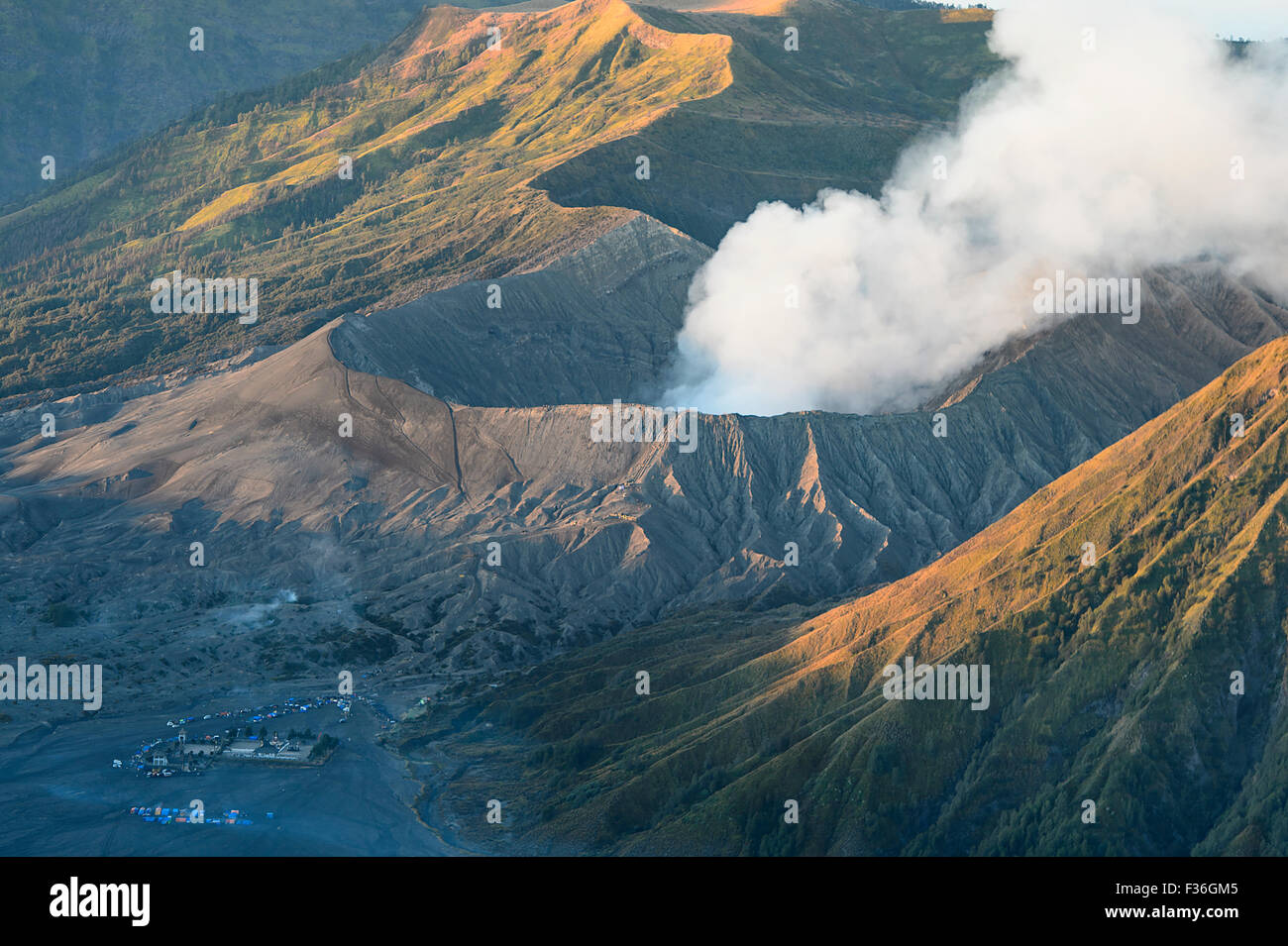 Mount Bromo, while the smoke and dust coming from the crater in the ...