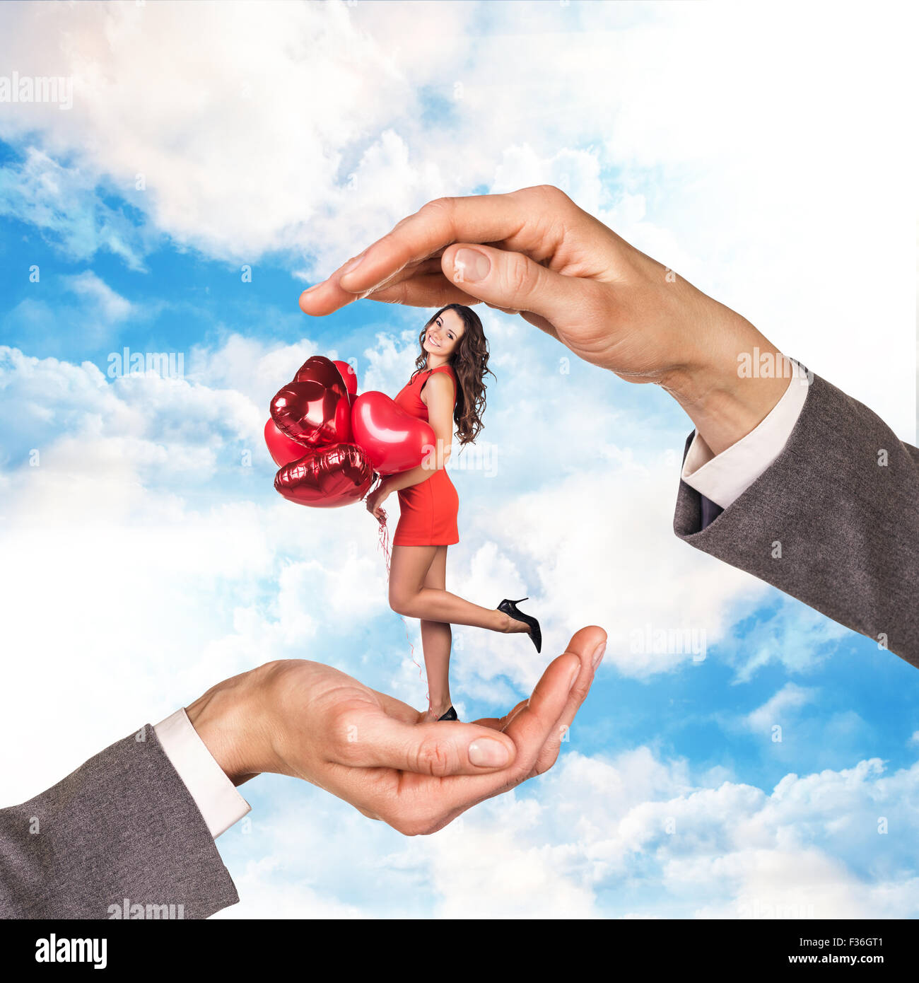 Woman carrying big present hi-res stock photography and images - Alamy
