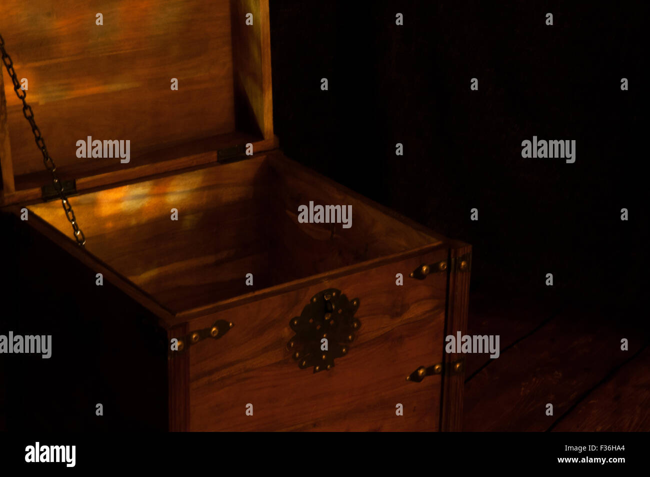 open treasure chest with a glowing light inside Stock Photo - Alamy