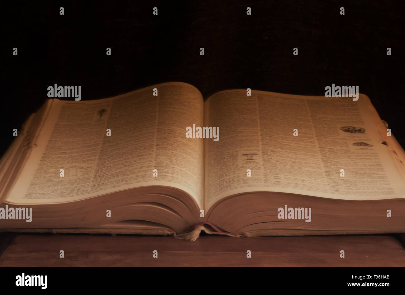 Open book of magic spells Stock Photo - Alamy