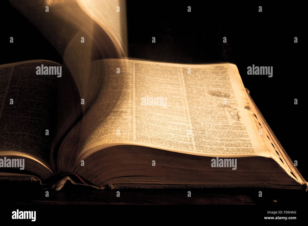 Flipping pages old book hi-res stock photography and images - Alamy