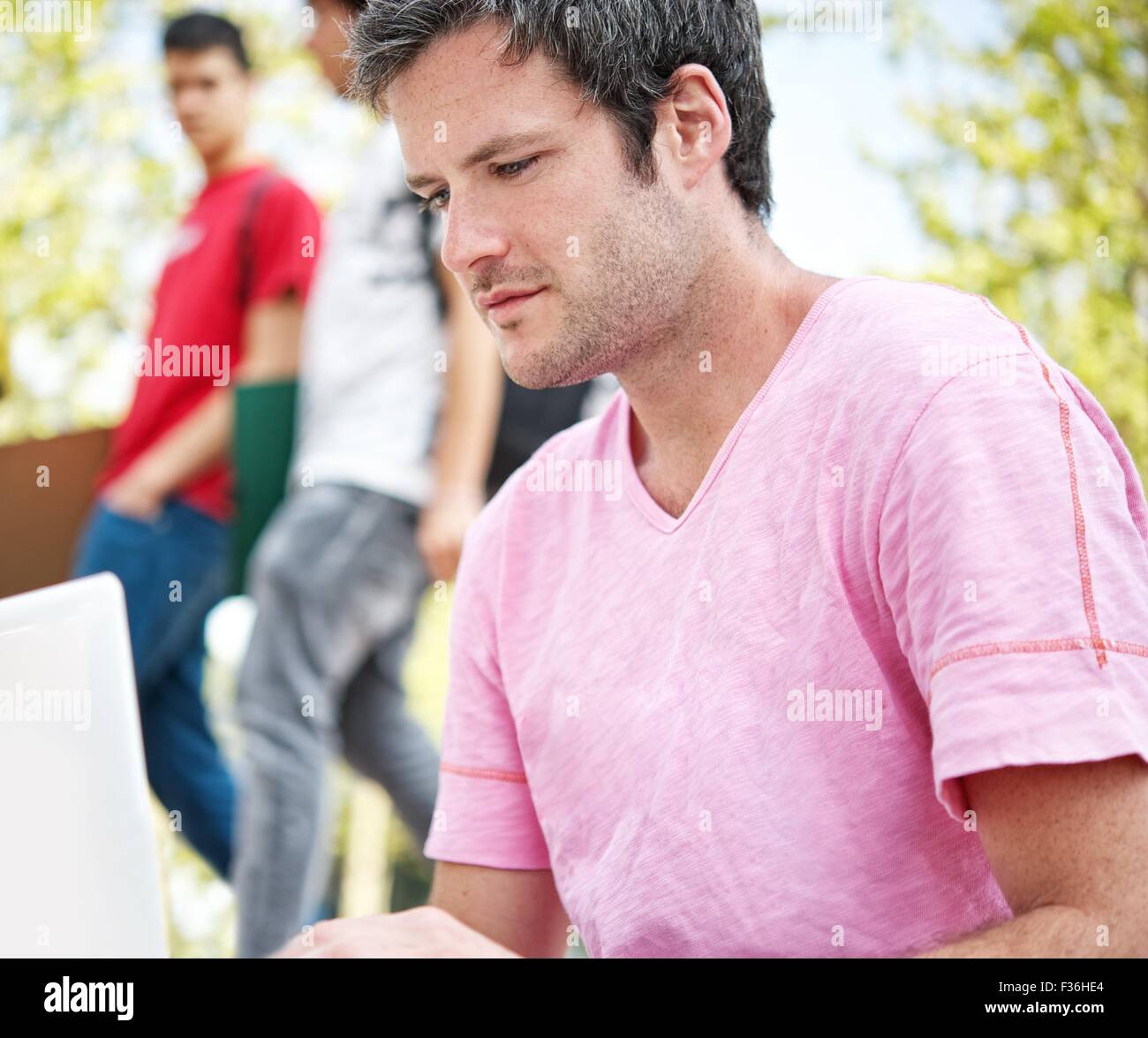 Thinking young handsome man Stock Photo - Alamy