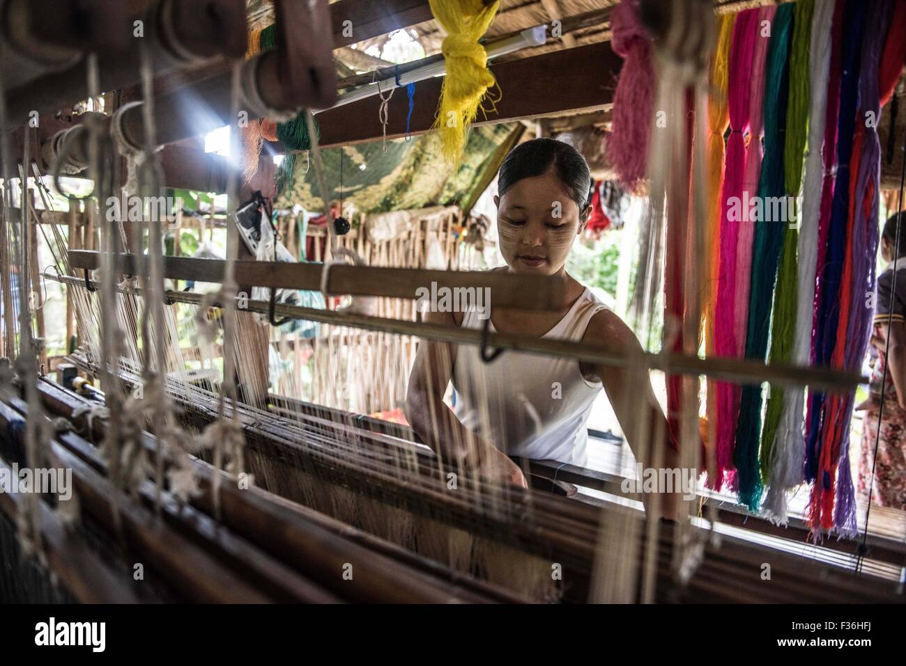 A woman works at a loom in Kachin State, Myanmar Stock Photo - Alamy