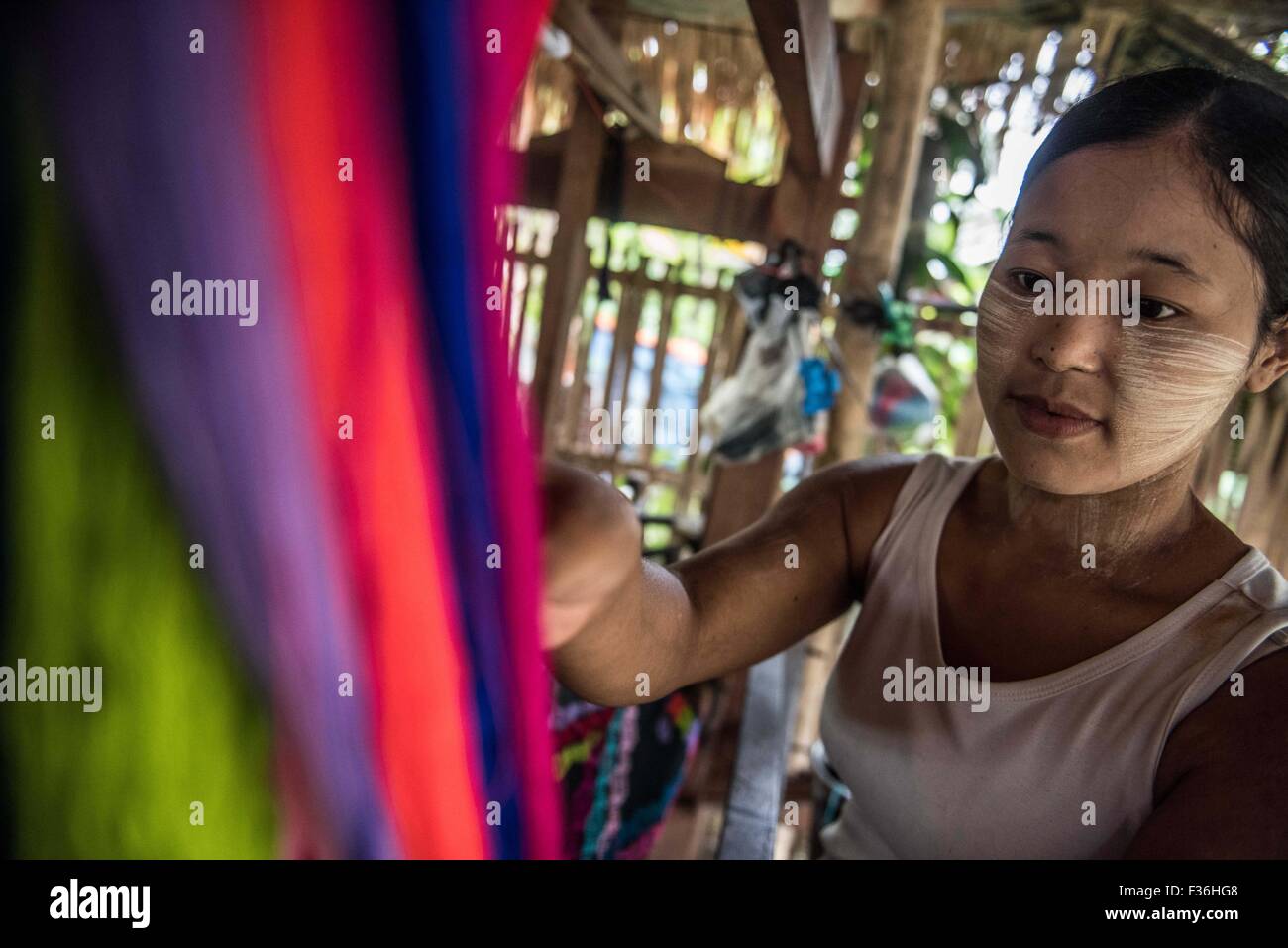 A woman works at a loom in Kachin State, Myanmar Stock Photo - Alamy