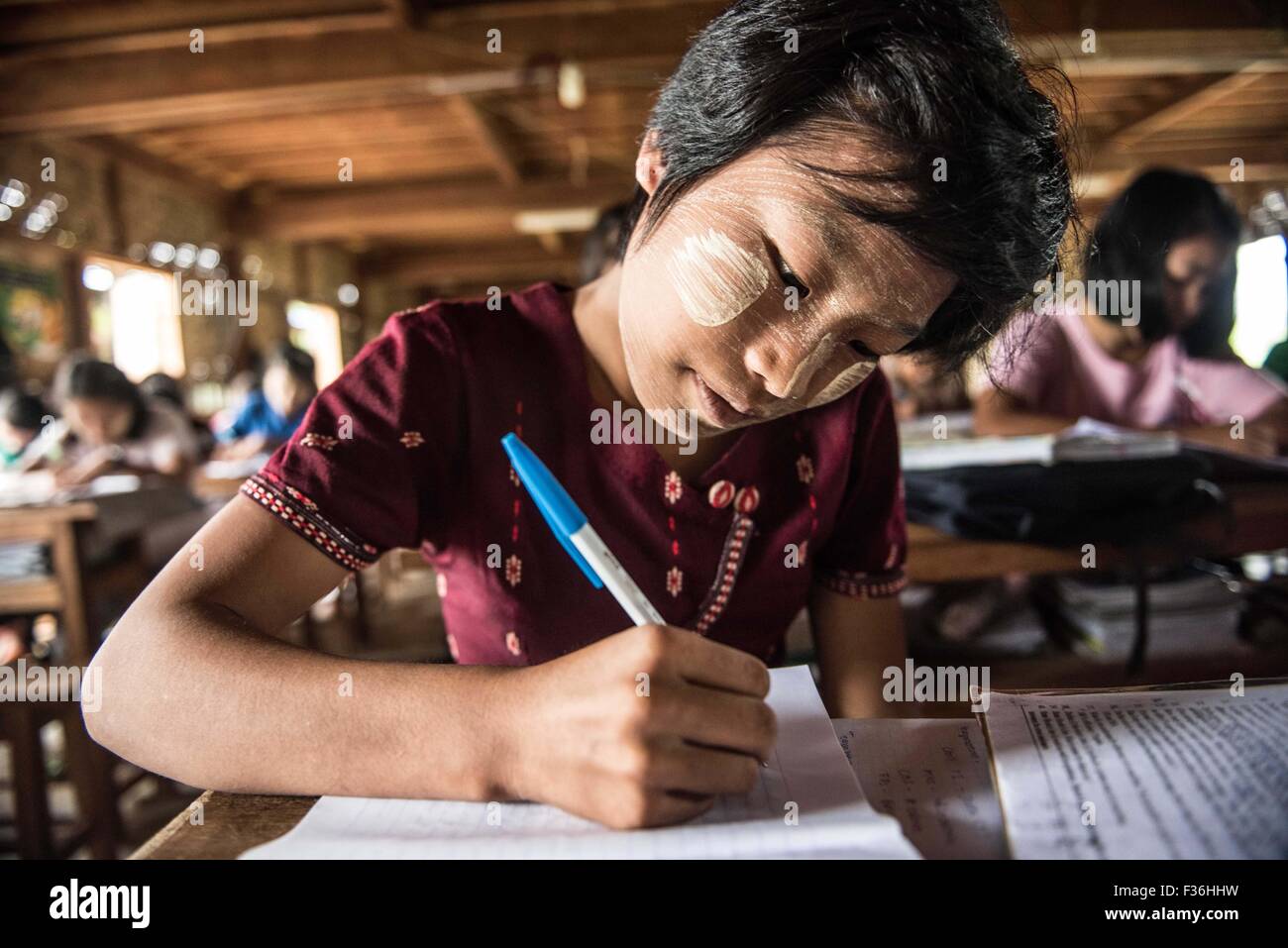 Schoolgirls study at a school in Kachin State, Myanmar Stock Photo - Alamy