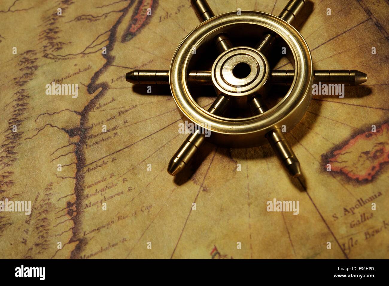 Sea wheel on the old map Stock Photo - Alamy