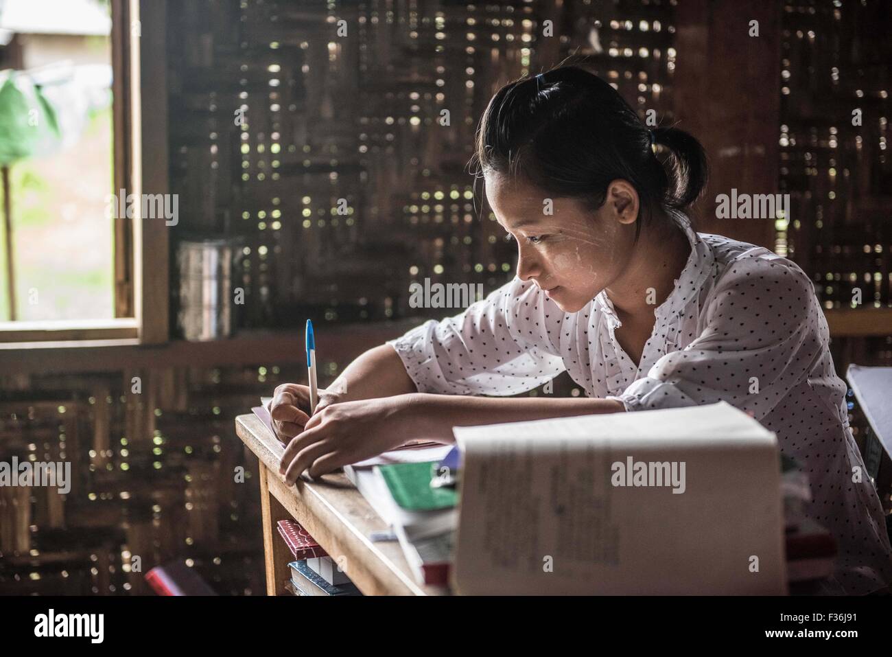 Schoolgirls study at a school in Kachin State, Myanmar Stock Photo - Alamy