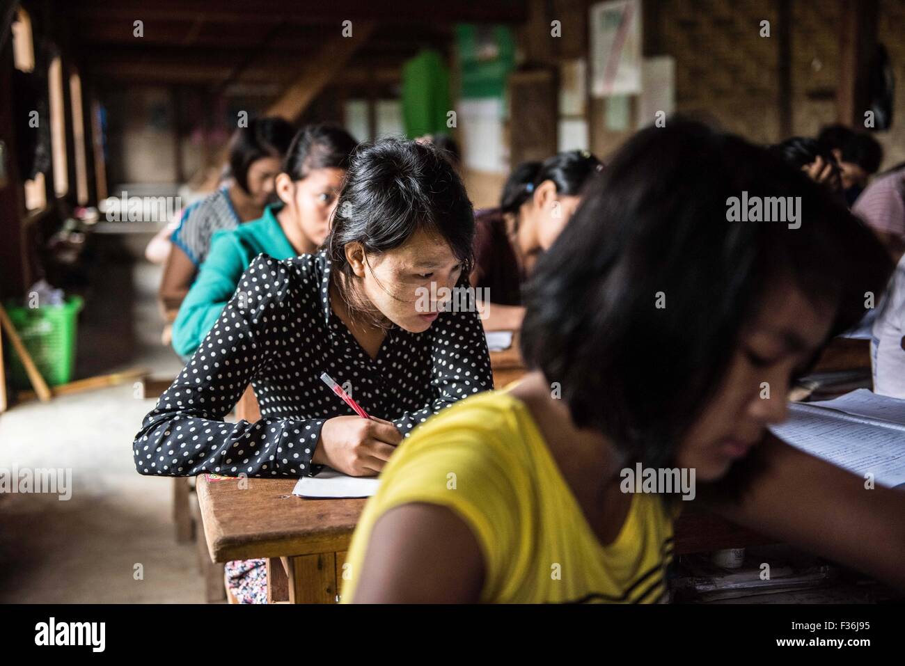 Schoolgirls study at a school in Kachin State, Myanmar Stock Photo - Alamy