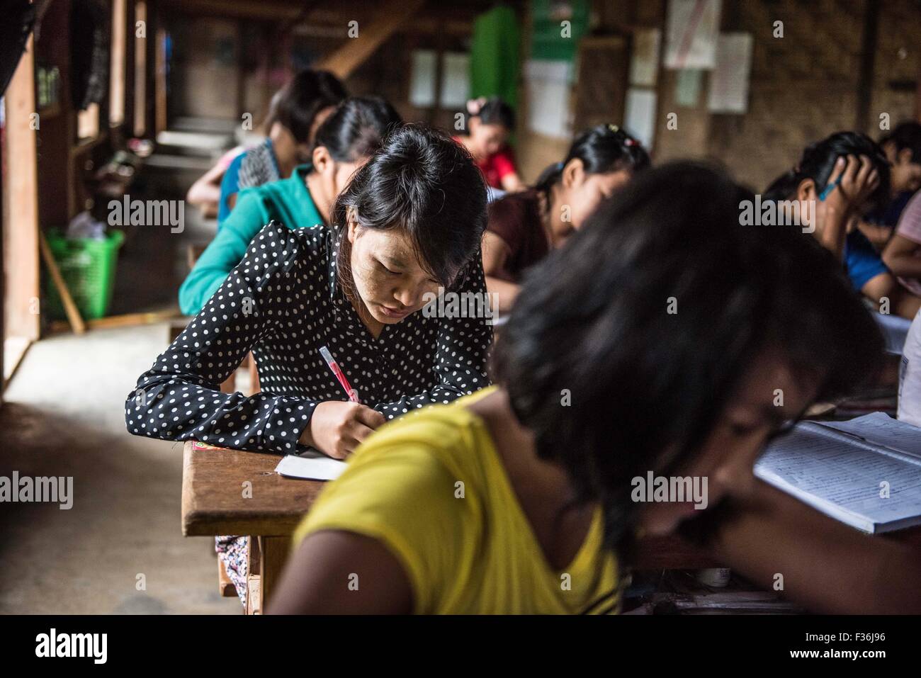Schoolgirls study at a school in Kachin State, Myanmar Stock Photo - Alamy