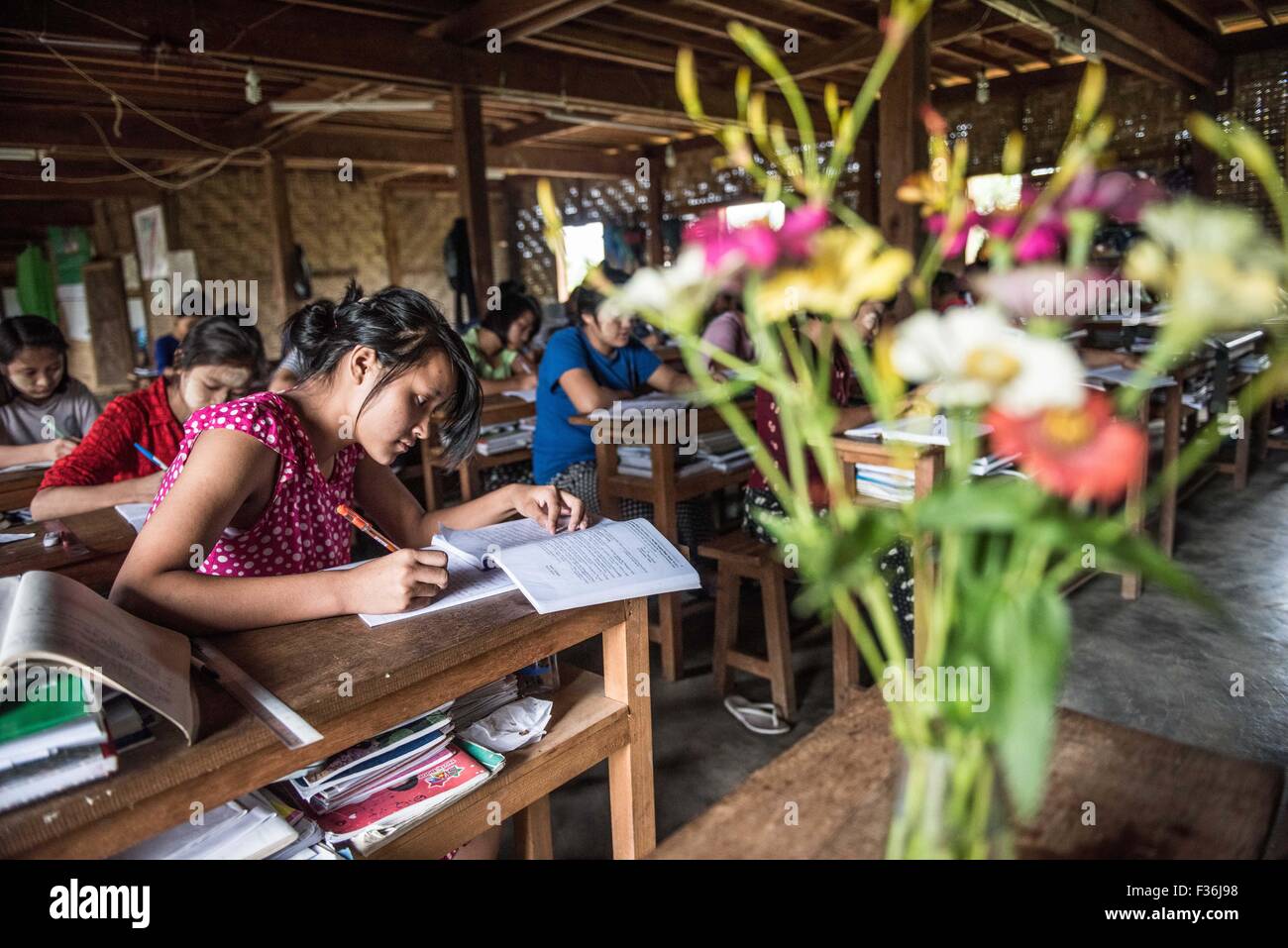 Schoolgirls study at a school in Kachin State, Myanmar Stock Photo - Alamy