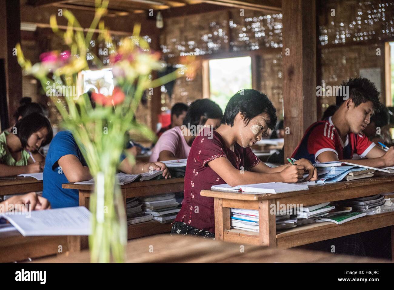 Schoolgirls study at a school in Kachin State, Myanmar Stock Photo - Alamy