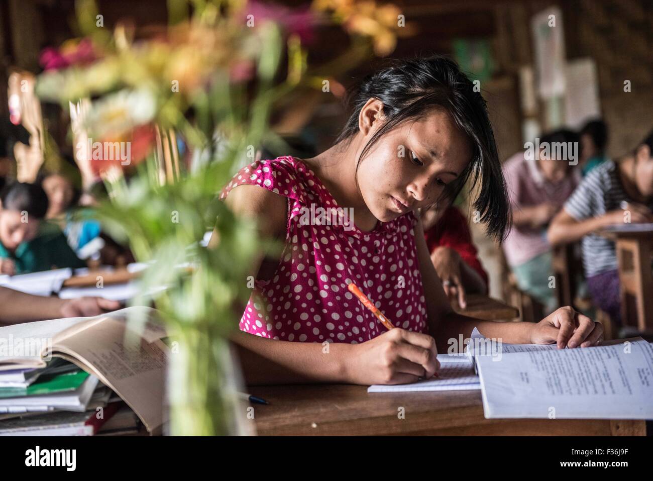 Schoolgirls study at a school in Kachin State, Myanmar Stock Photo - Alamy