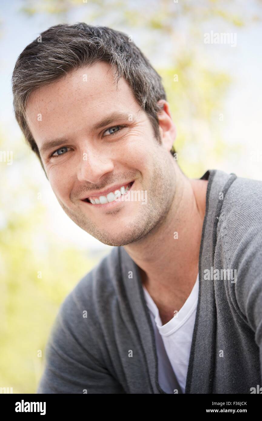 Handsome man smiling portrait Stock Photo - Alamy