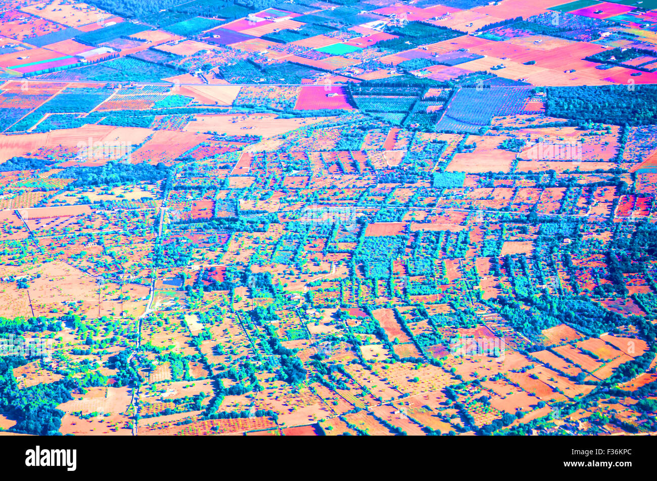 Mallorca aerial landscape pattern in greens and red saturated earth ...