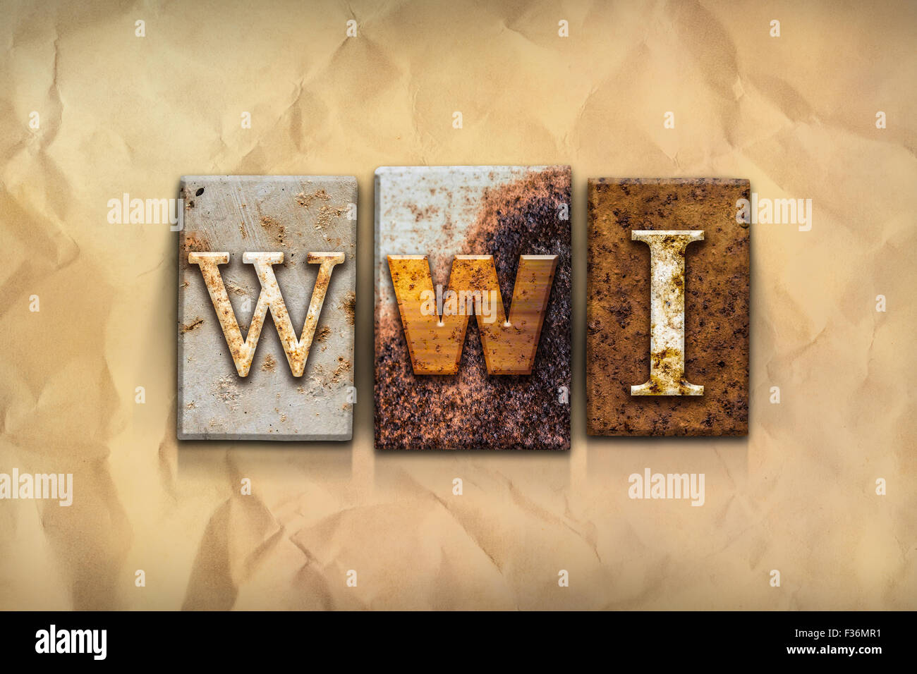 The word "WWI" written in rusty metal letterpress type on a crumbled ...