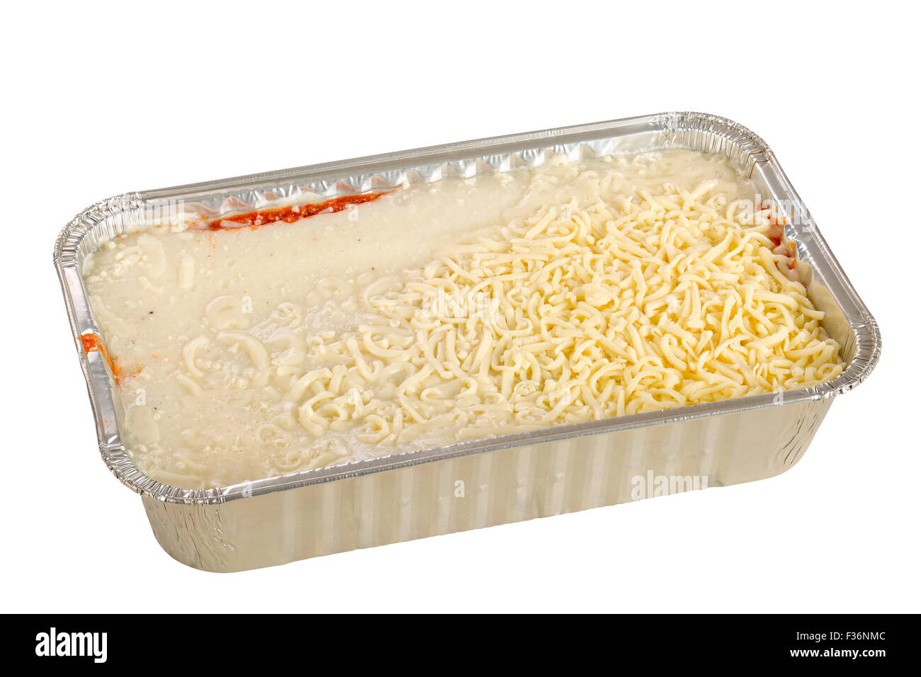 Frozen lasagna in the mold of aluminum isolated on white background ...