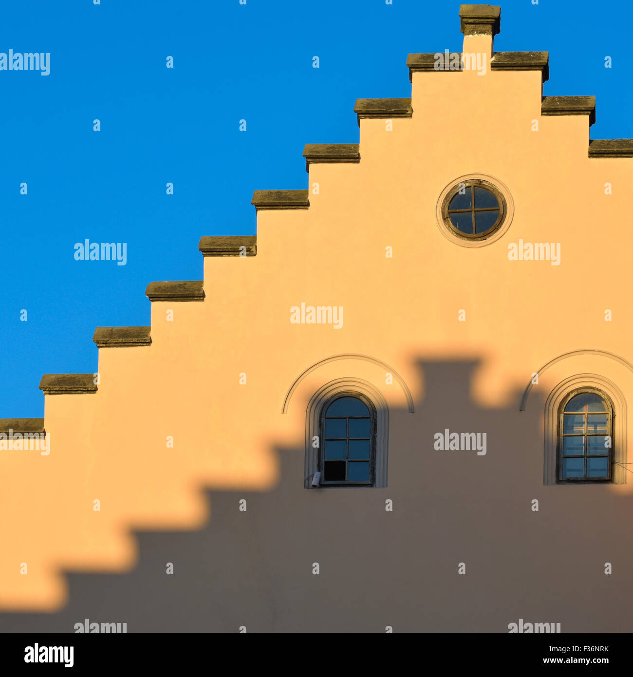 Geometric play of the shadows on the building Stock Photo - Alamy