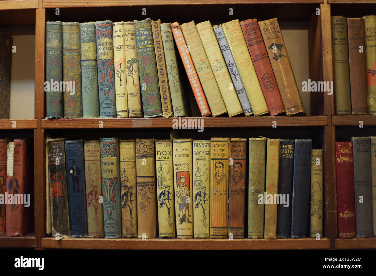 Vintage books on a shelf Stock Photo - Alamy