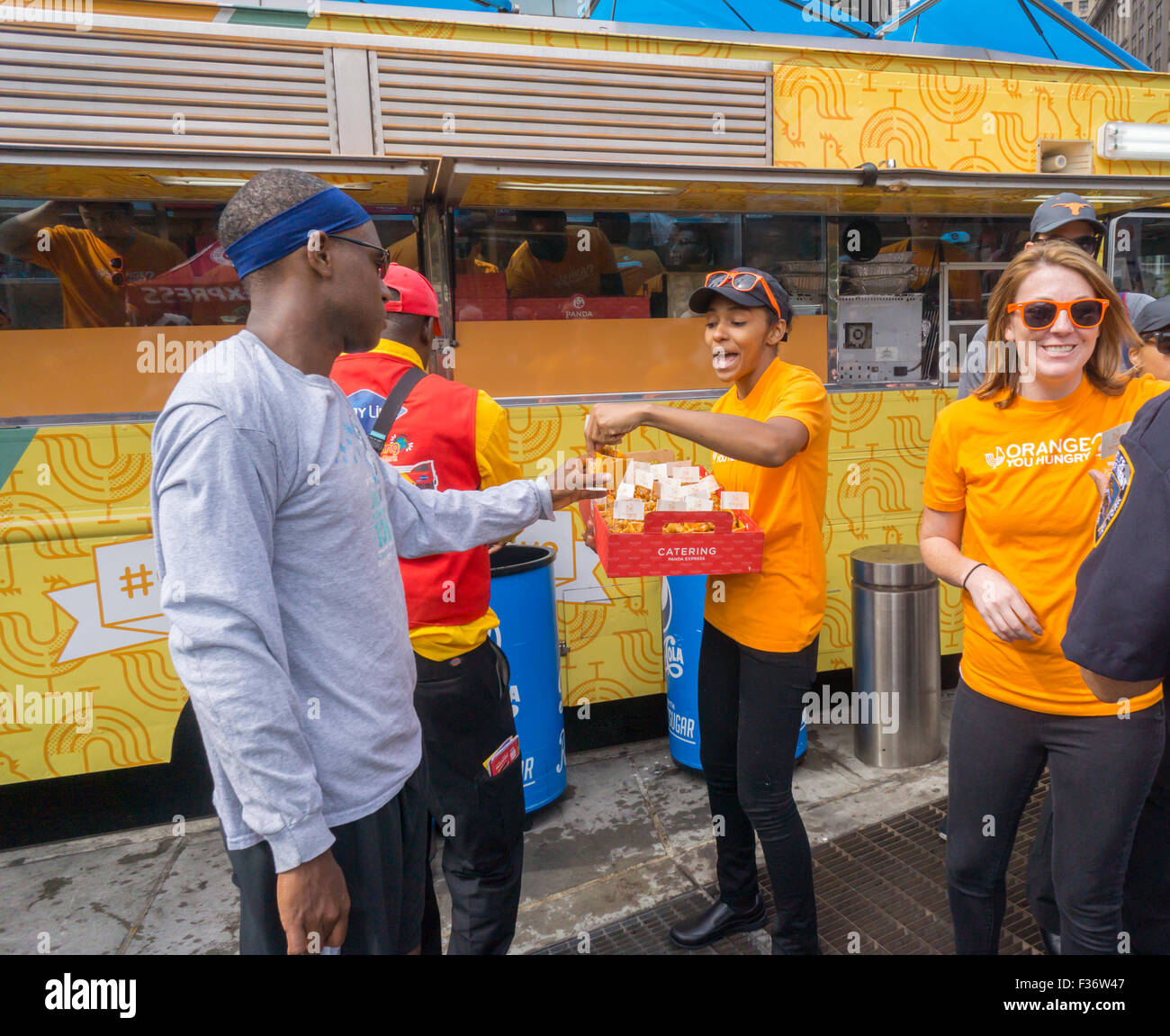 Hundreds eat samples of Panda Express' signature Orange Chicken at ...