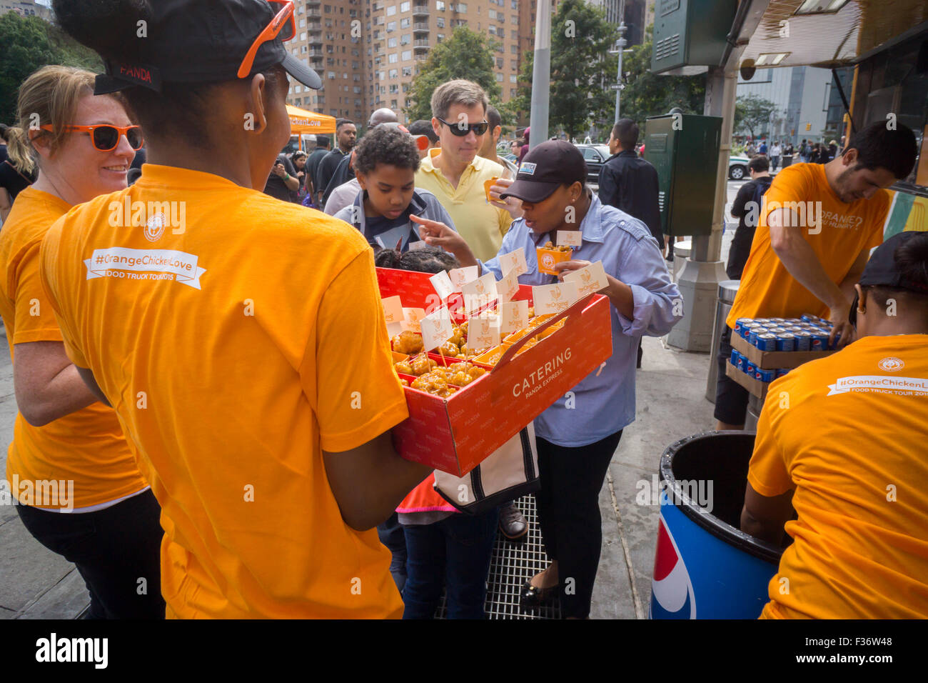 Hundreds eat samples of Panda Express' signature Orange Chicken at ...