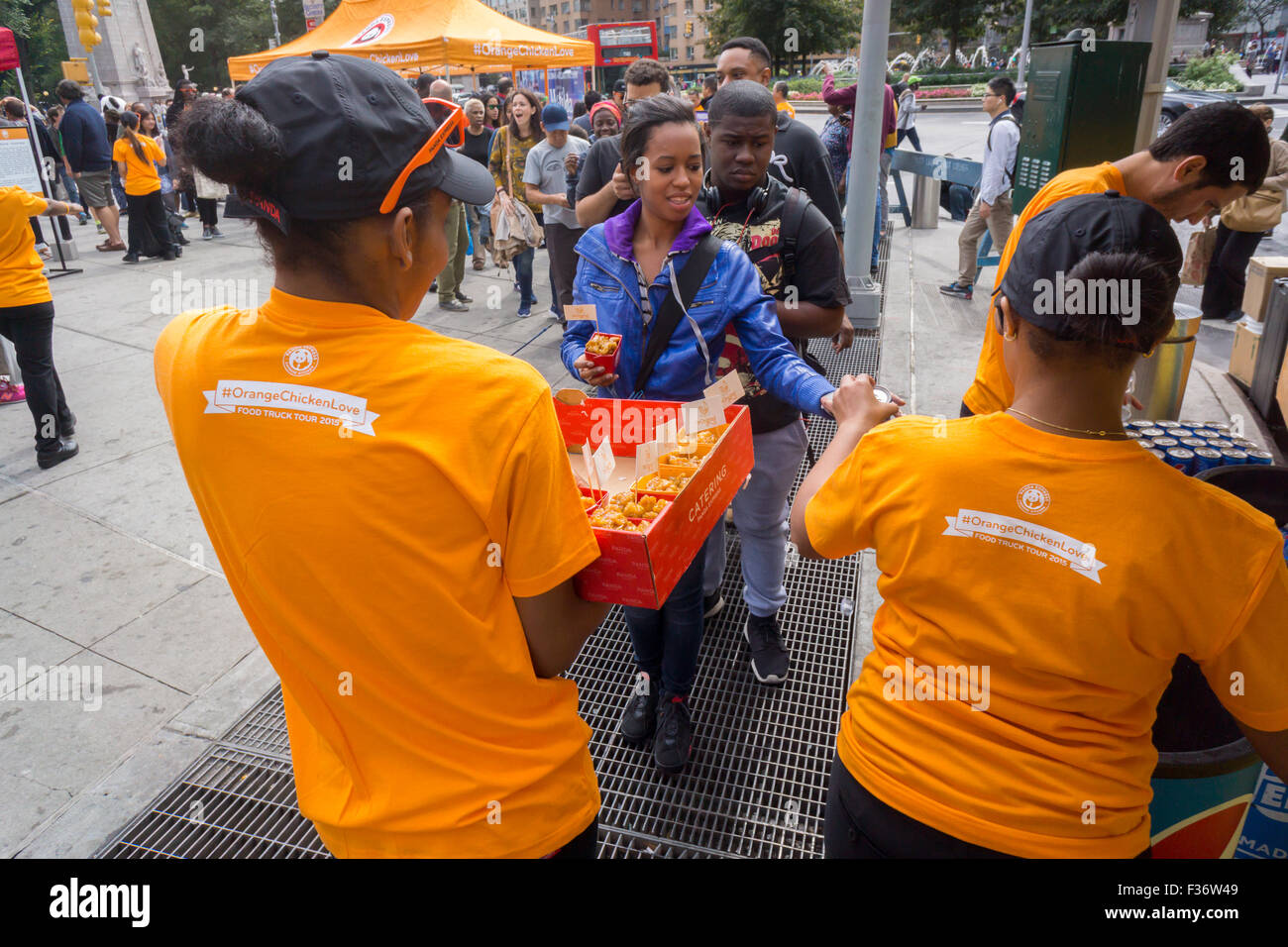 Hundreds eat samples of Panda Express' signature Orange Chicken at ...