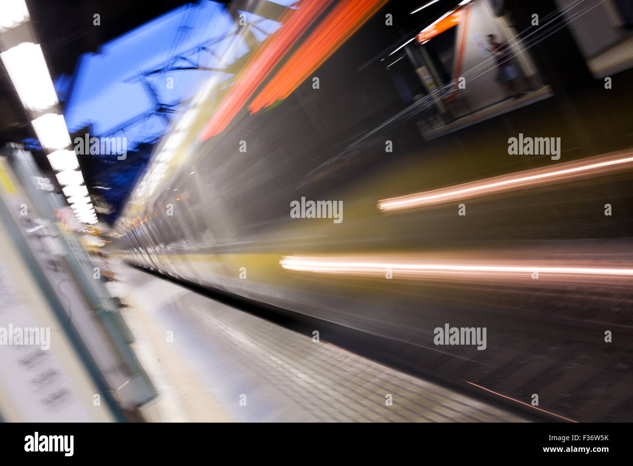 Subway long exposure blur on train with lights Stock Photo - Alamy