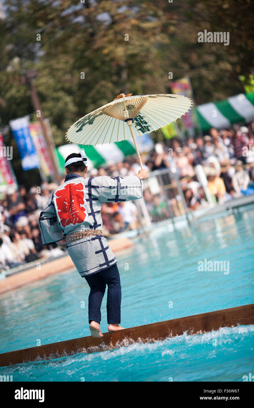 traditional Japanese yukata balancing on square log on water Stock ...