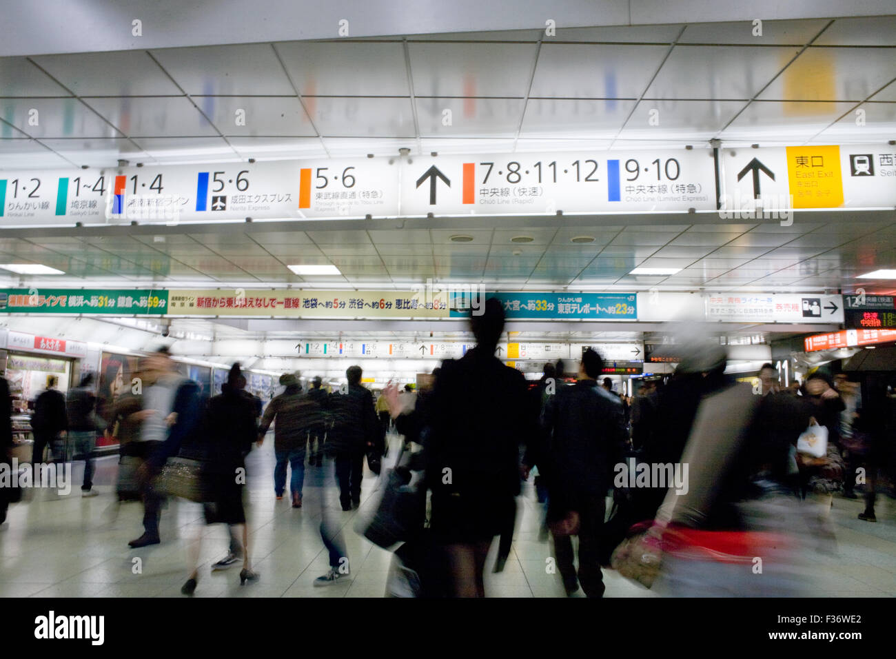 People traffic moving through train station with motion blur Stock ...