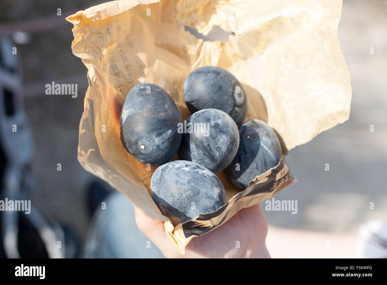 Black shell onsen eggs Stock Photo - Alamy
