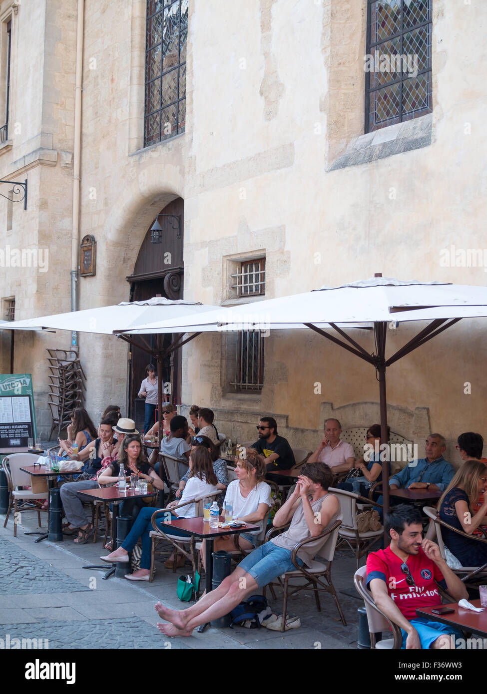 People at a terrace in Saint-Project Square Stock Photo - Alamy