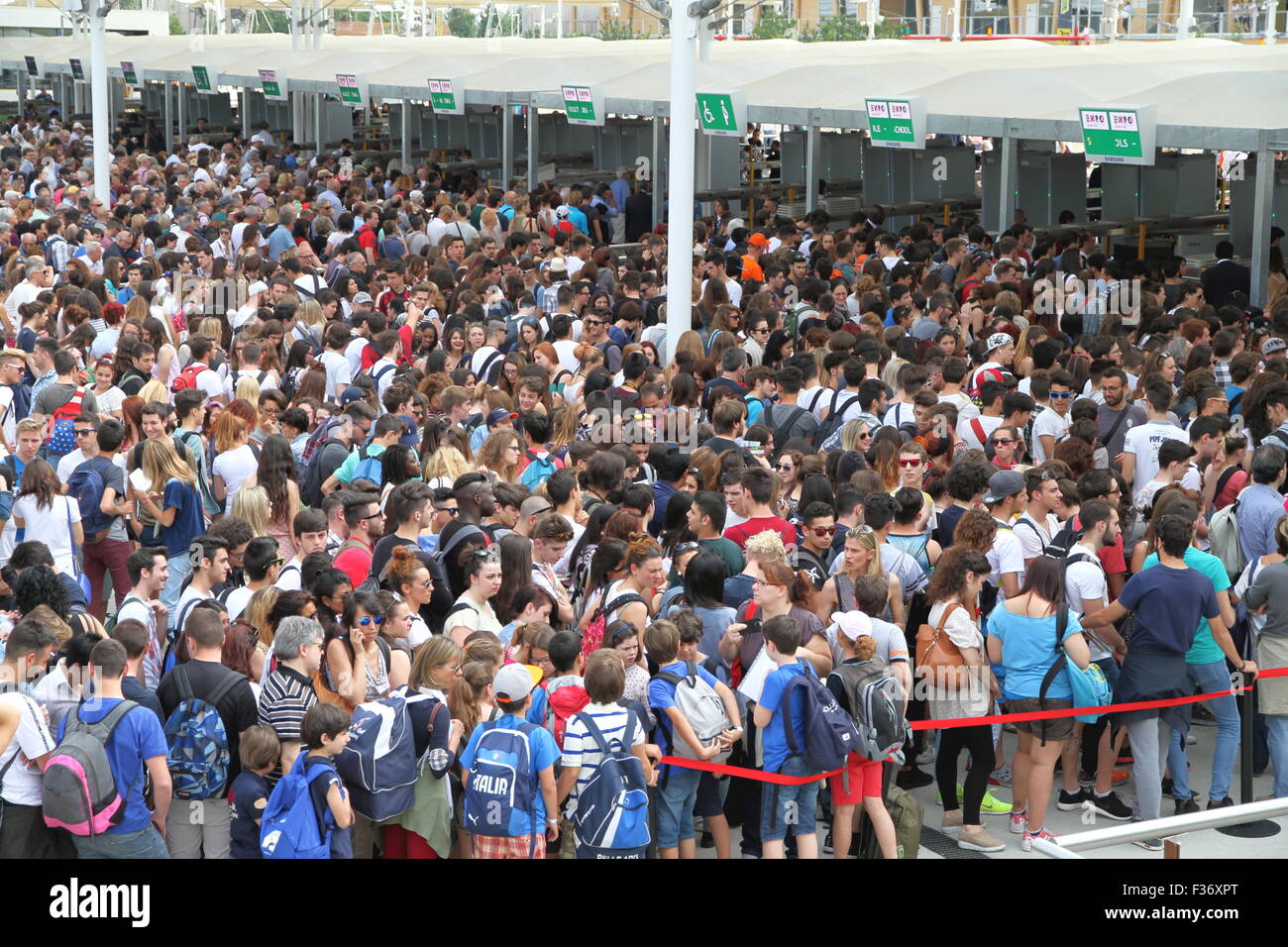 Crowd outside the Expo gates in Milan, Italy Stock Photo - Alamy