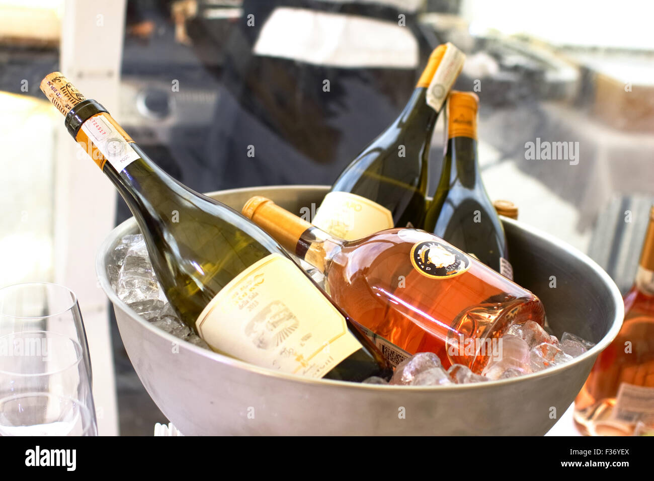 cooled wine bottle in ice cubes Stock Photo - Alamy