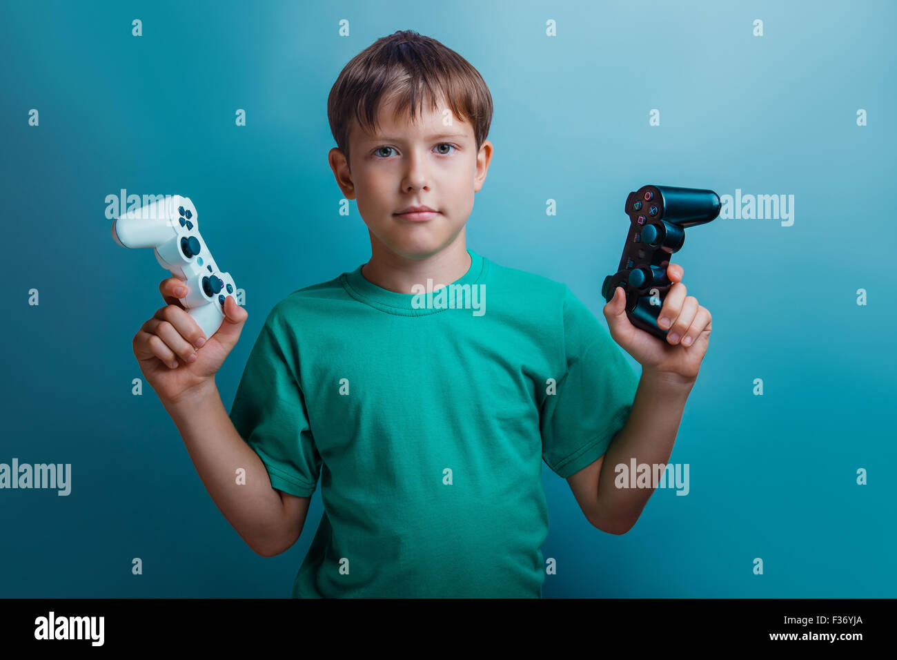 Happy boy playing video games hi-res stock photography and images - Alamy