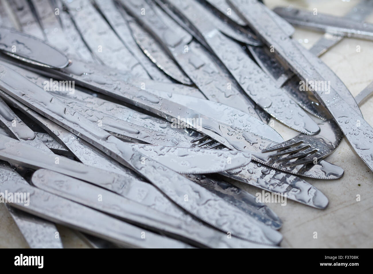 lot of knives and forks Stock Photo - Alamy