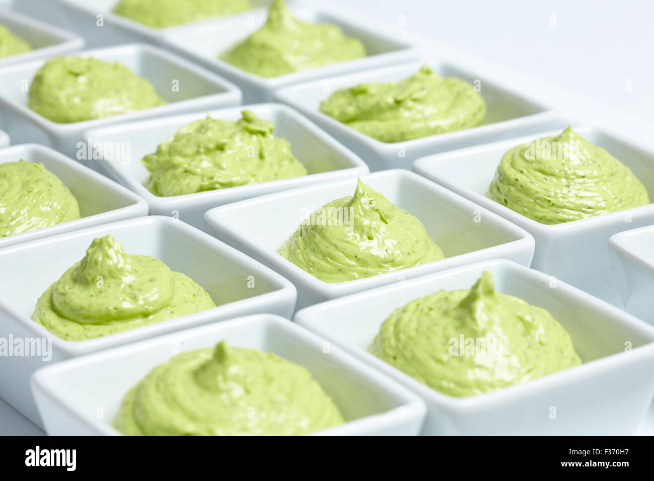 butter mixed with herbs in small plates at the buffet Stock Photo - Alamy