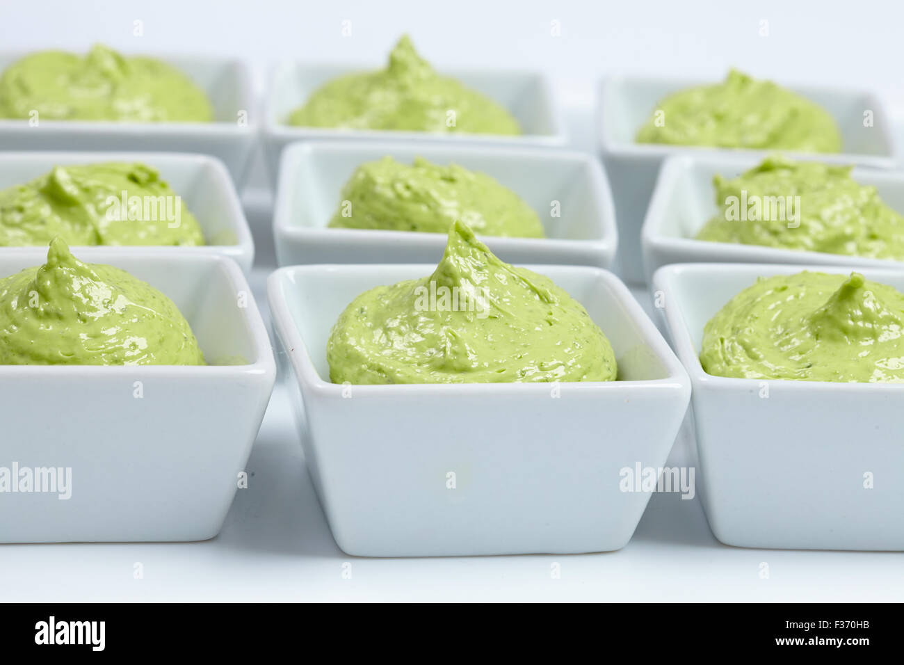 butter mixed with herbs in small plates at the buffet Stock Photo - Alamy