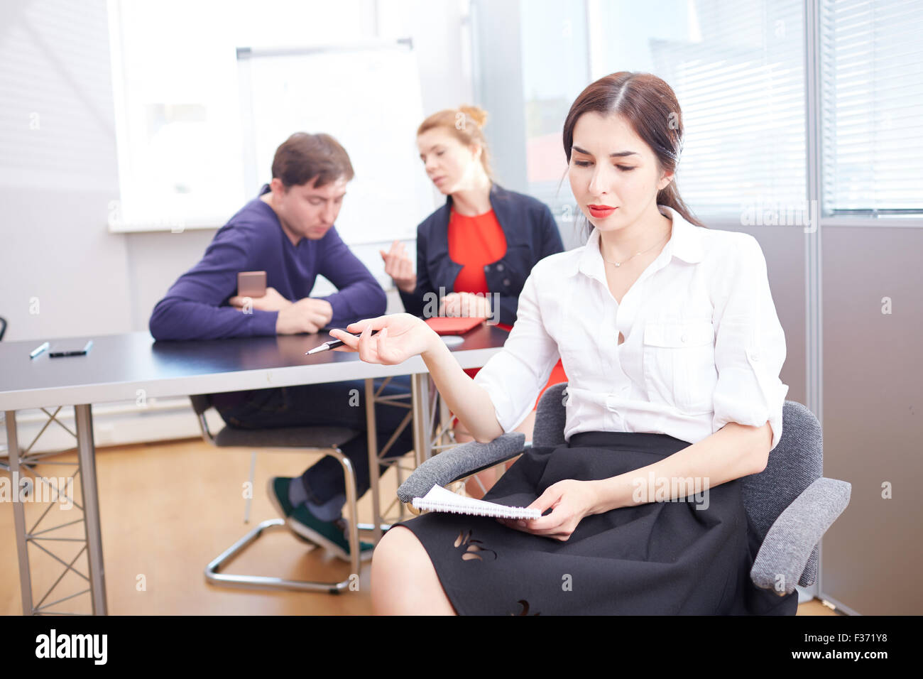 Three businessmen working in the office Stock Photo - Alamy