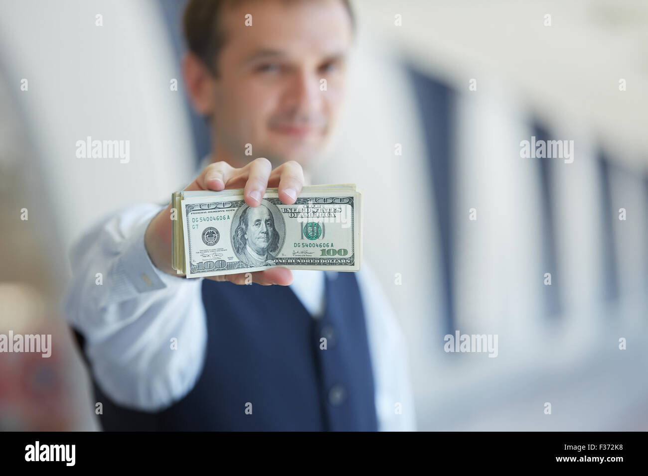closeup money in male hands Stock Photo - Alamy