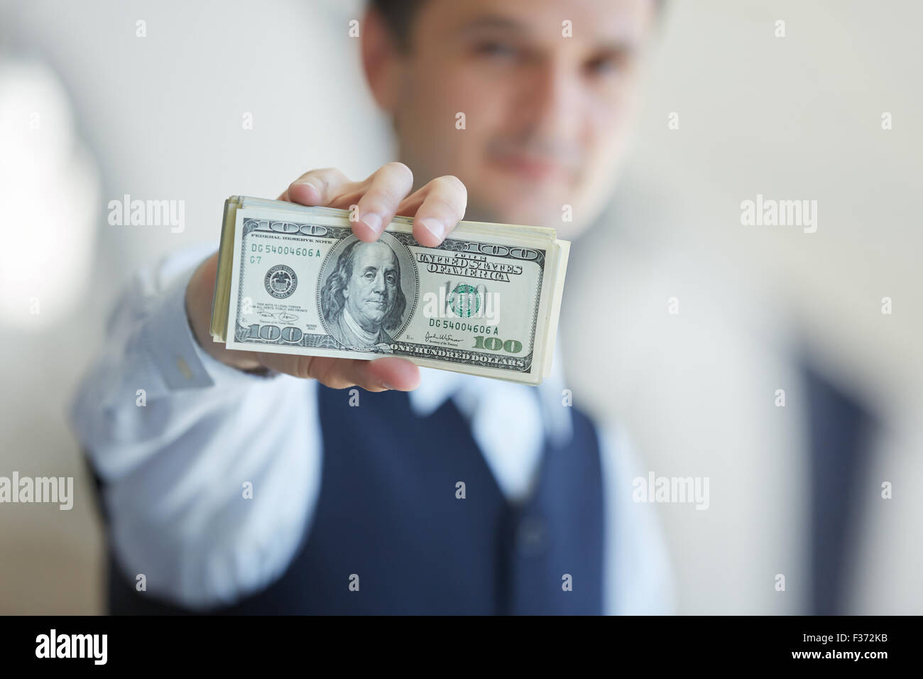 closeup money in male hands Stock Photo - Alamy