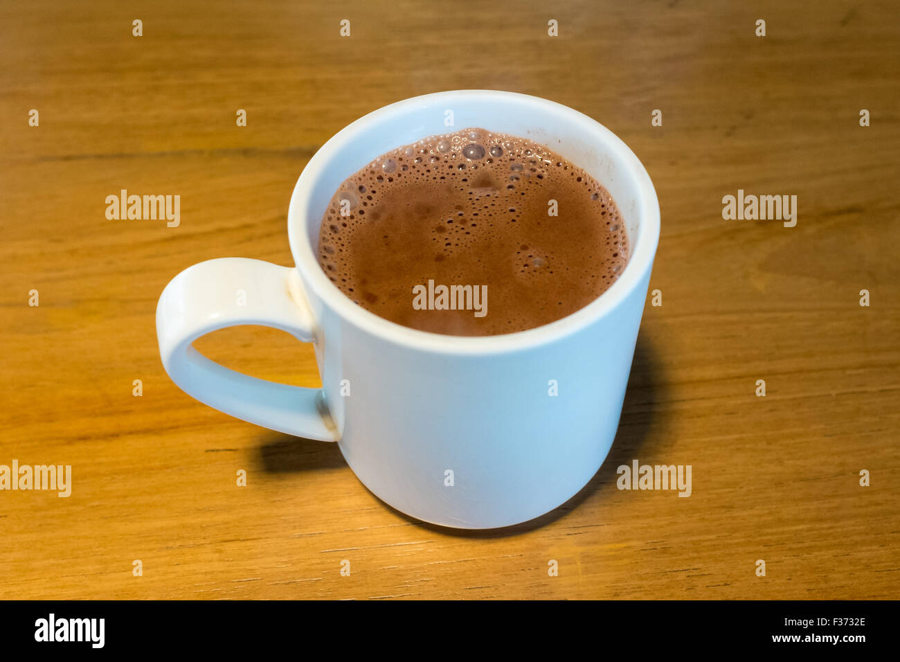 Pure hot chocolate in a white mug Stock Photo - Alamy