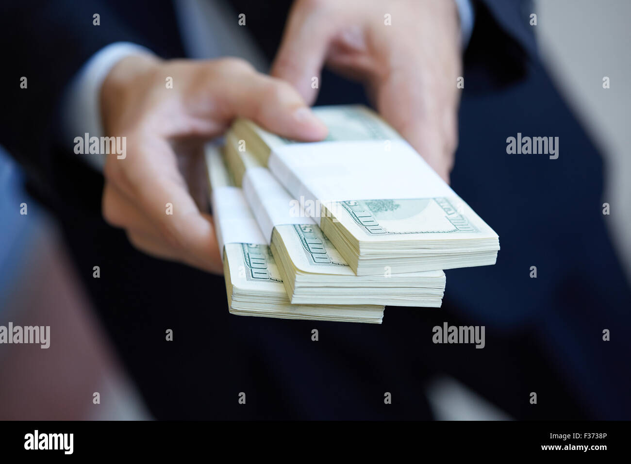 closeup money in male hands Stock Photo - Alamy