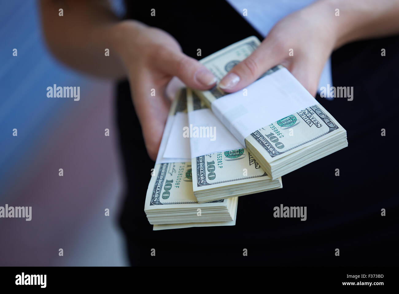 Money close-up in women's hands Stock Photo - Alamy