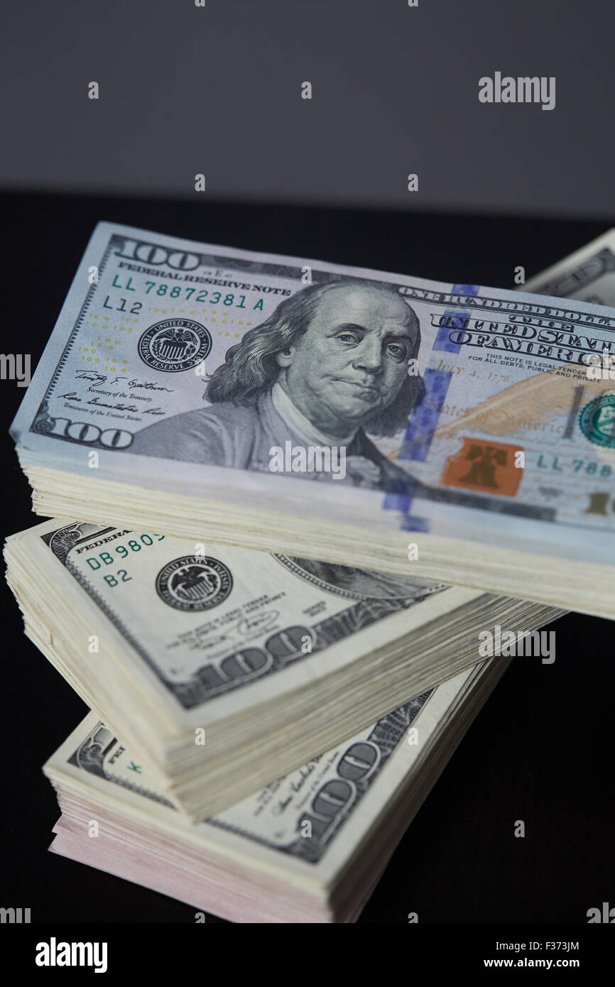 stack of money on the table Stock Photo - Alamy