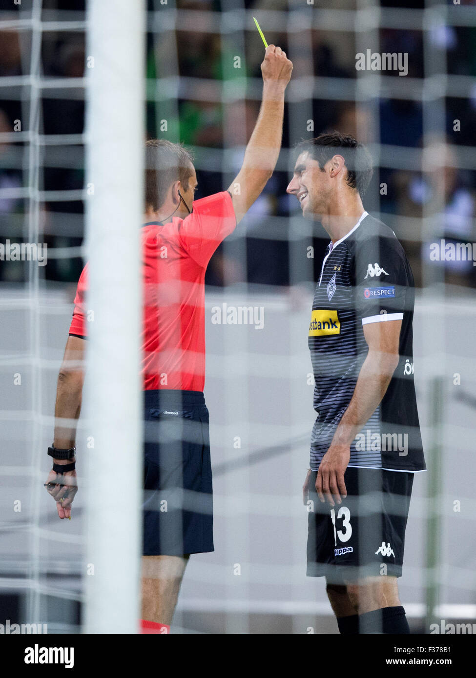 Moenchengladbach, Germany. 30th Sep, 2015. Referee Clement Turpin (L ...