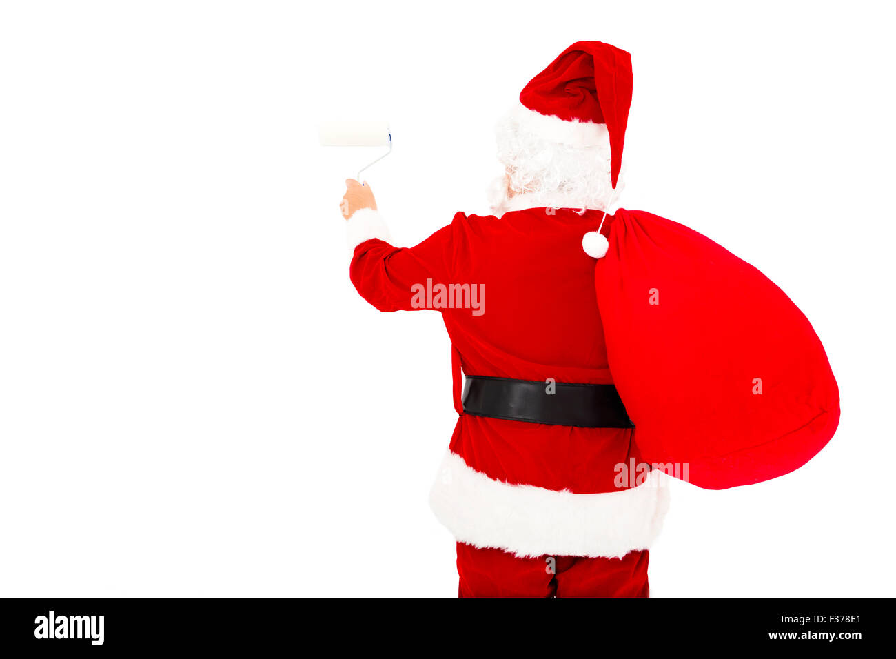 Rear view man painting wall Cut Out Stock Images & Pictures - Alamy