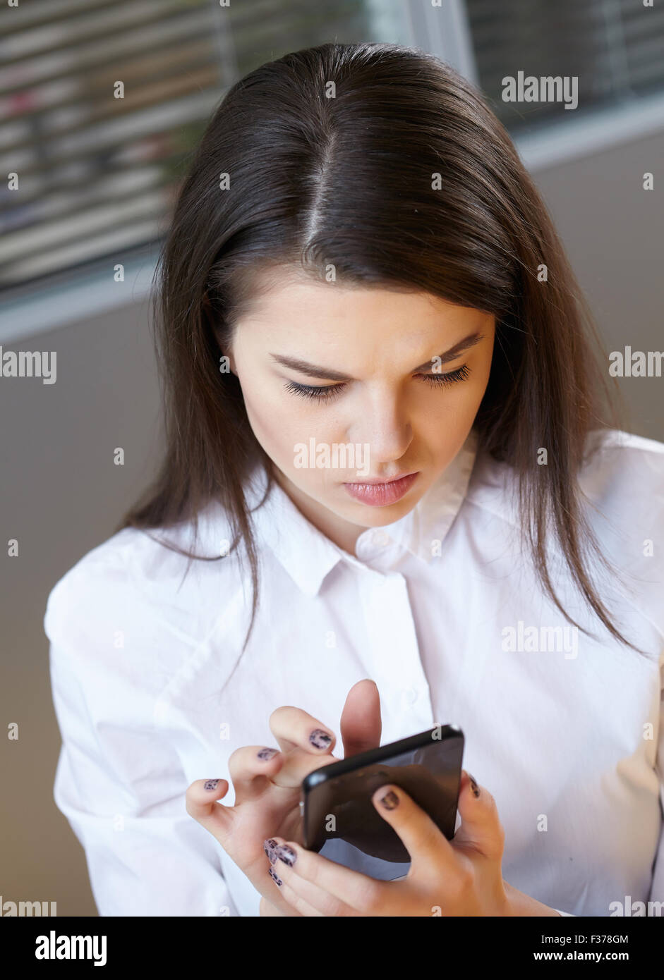 business woman in the office with phone Stock Photo - Alamy