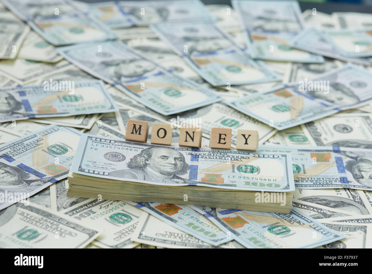 much money. Wooden blocks - the inscription money Stock Photo - Alamy