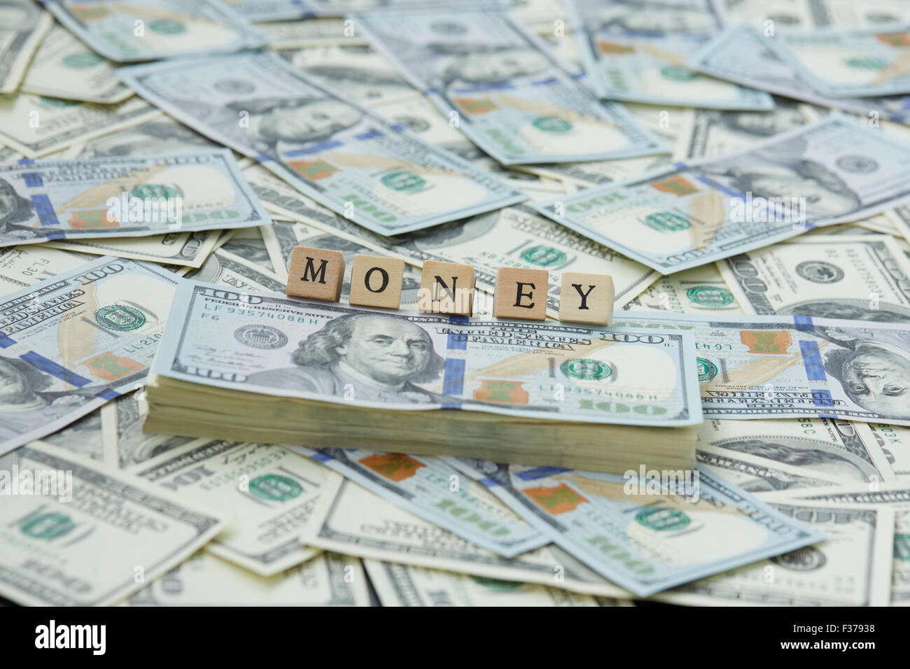 much money. Wooden blocks - the inscription money Stock Photo - Alamy