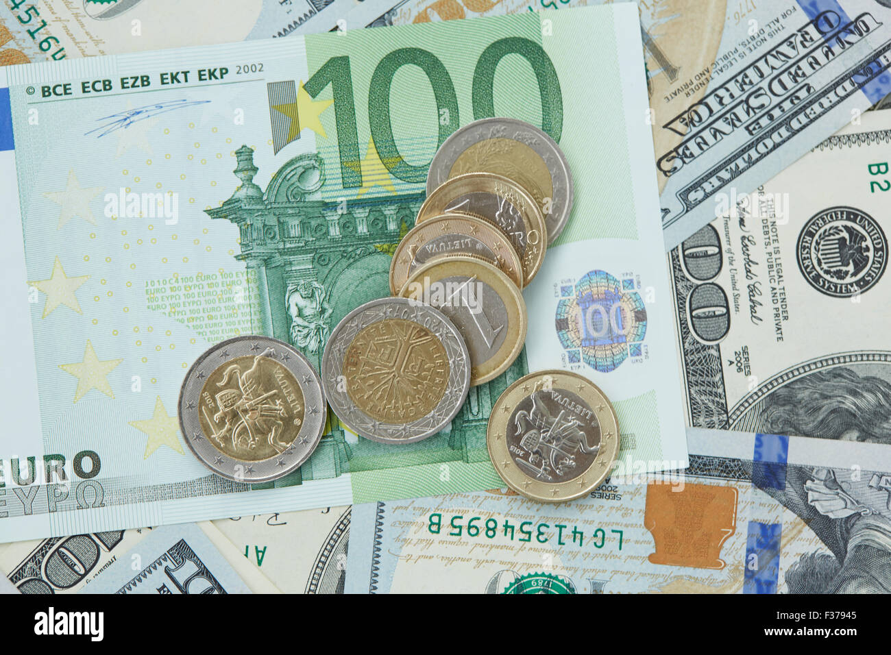 dollars and euro coins Stock Photo - Alamy