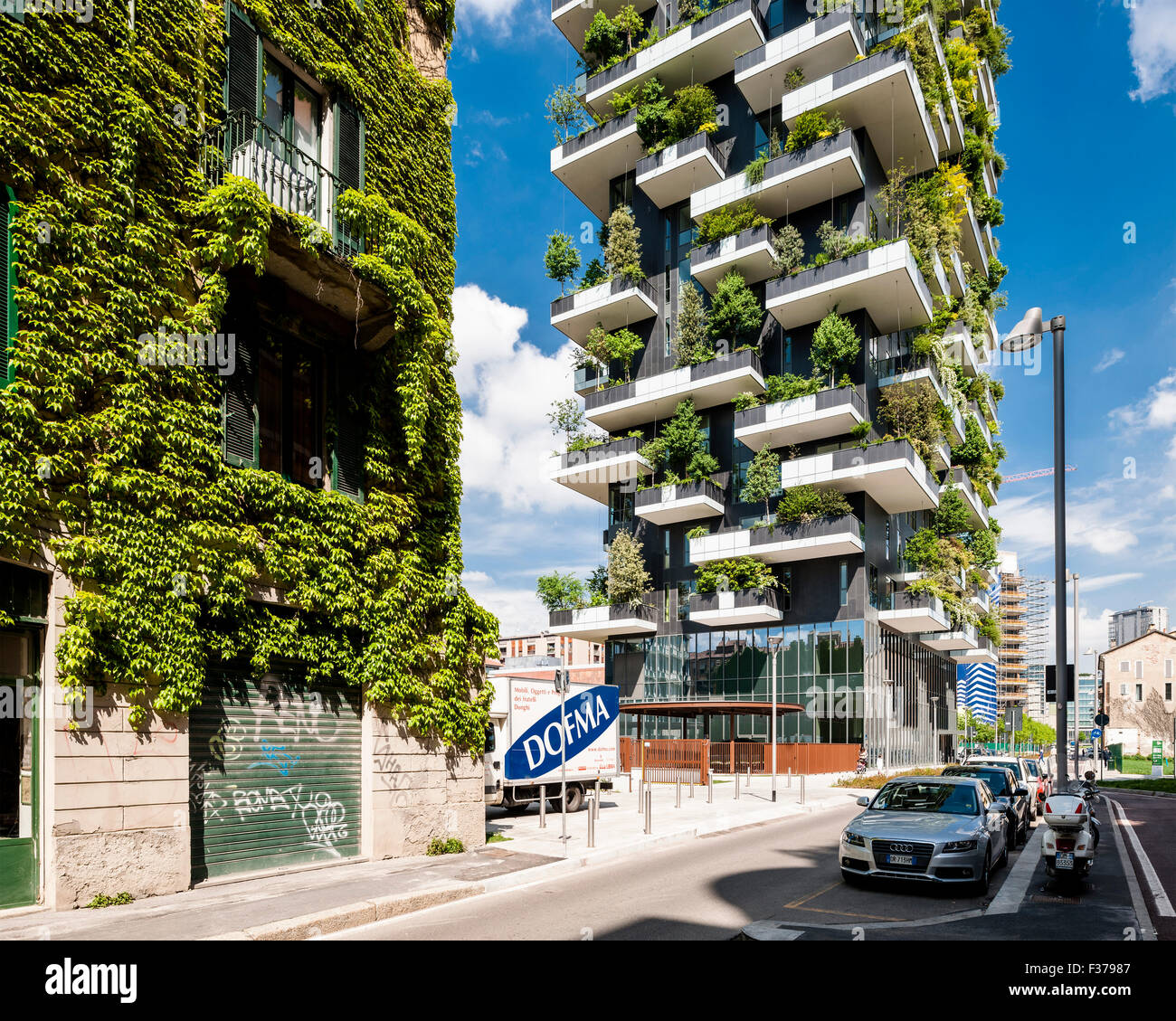 Deatil view of vertical forest with adjacent vernacular building ...